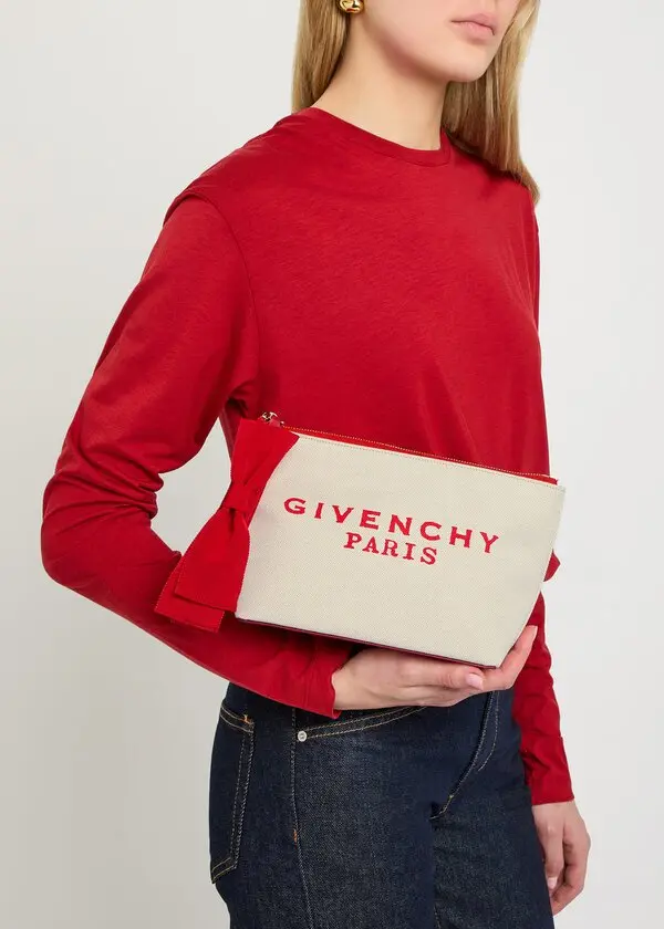 Givenchy Logo Print Canvas Wristlet Clutch With Bow Detail