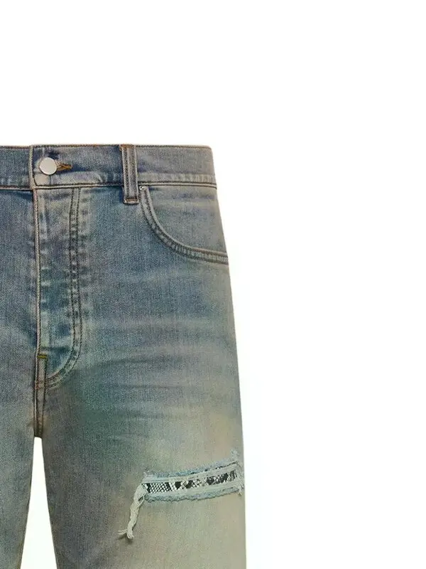 Amiri Distressed Snake Slim Jeans