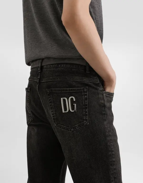 Dolce & Gabbana Denim Trousers With Dg Patch