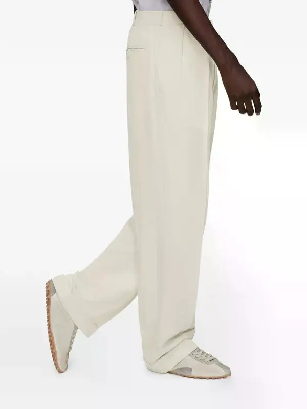 MAISON MARGIELA Cuffed Pleated Trousers - Neutrals