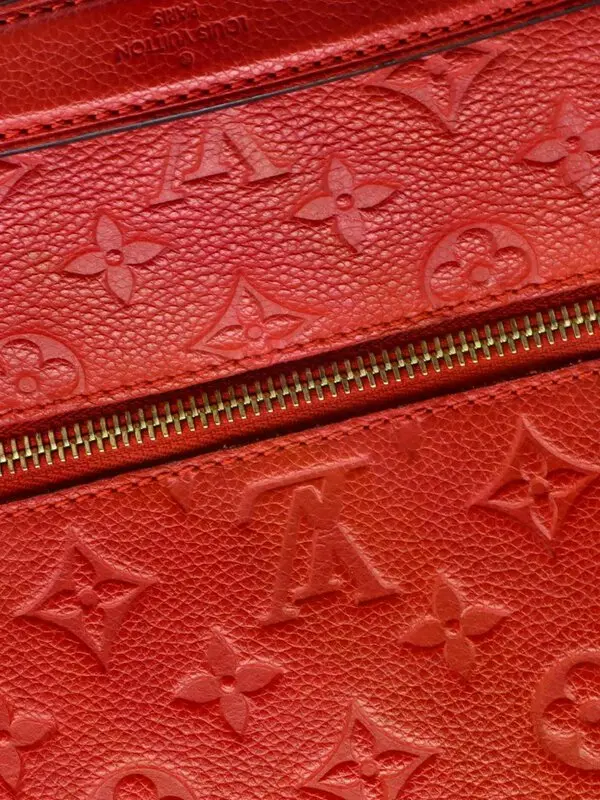 LOUIS VUITTON Pochette Metis Monogram Empreinte Leather Crossbody Bag - Red