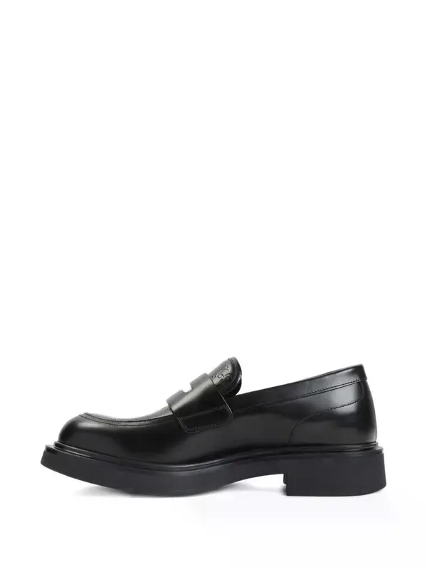 Gucci Monogram Debossed Loafers