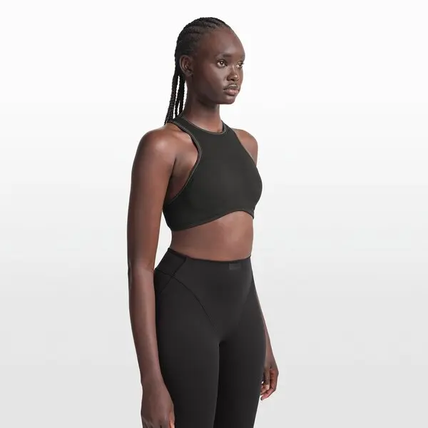 SKIMS Racer Front Bra Obsidian | Black | | Nike Ribbed Seamless - Obsidian/armor