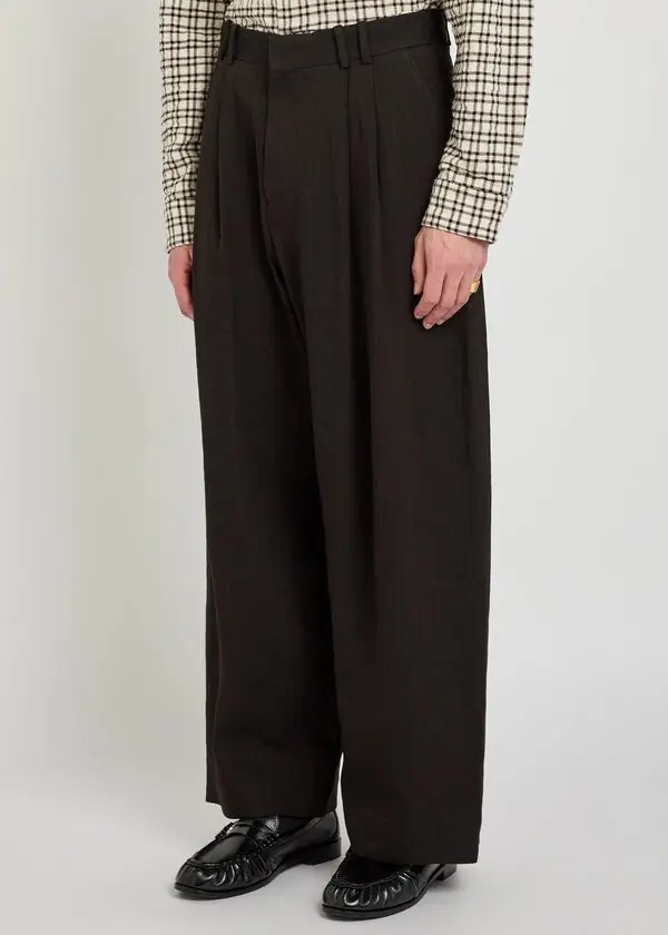 Studio Nicholson Pleated Wide-leg Trousers