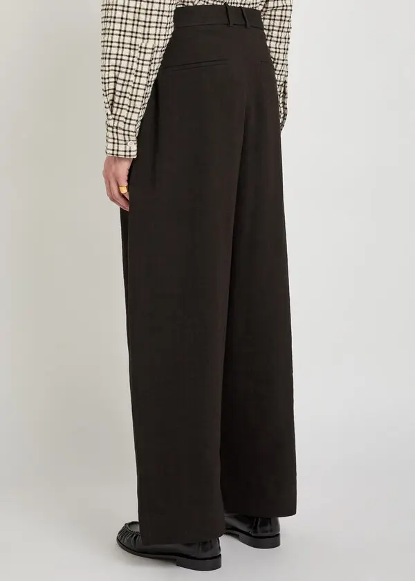 Studio Nicholson Pleated Wide-leg Trousers