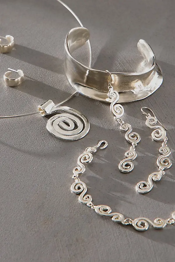 TAKARA Spiral Dangle Earrings