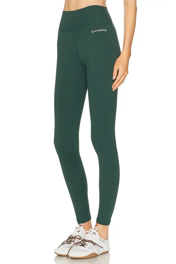 SPORTY & RICH Serif Logo Legging In Dark Green