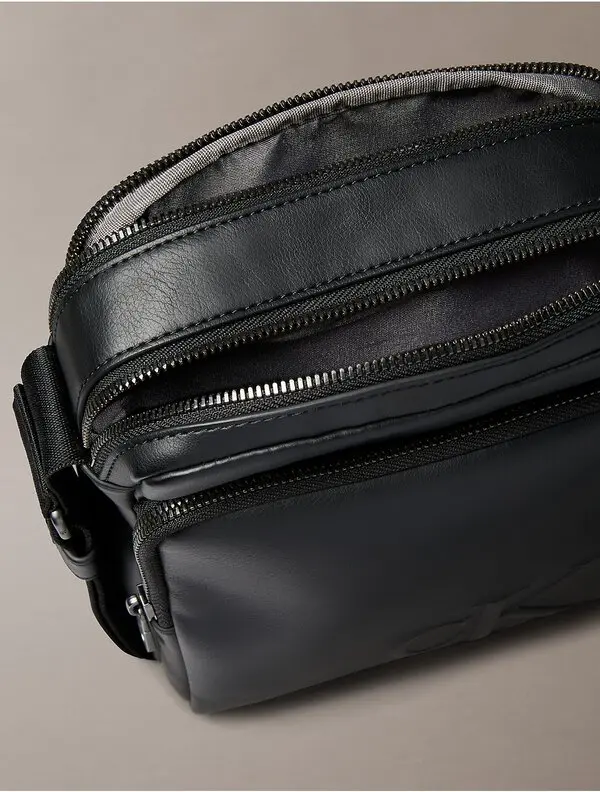 Calvin Klein Embossed Monogram Reporter Bag With Zip Pocket