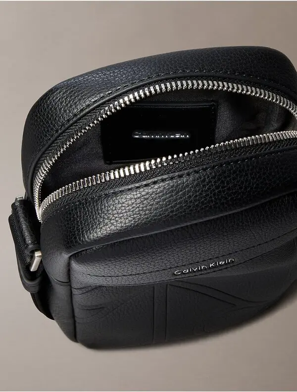 Calvin Klein Allover Embossed Emblem Logo Reporter Bag - Black