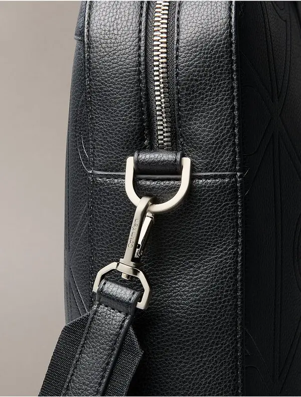 Calvin Klein Embossed Logo Commuter Bag