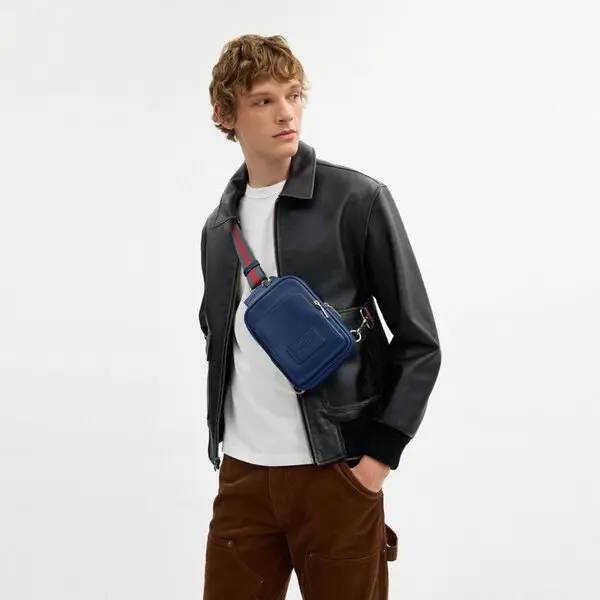 COACH Racer Sling Pack With Varsity Stripe Webbing