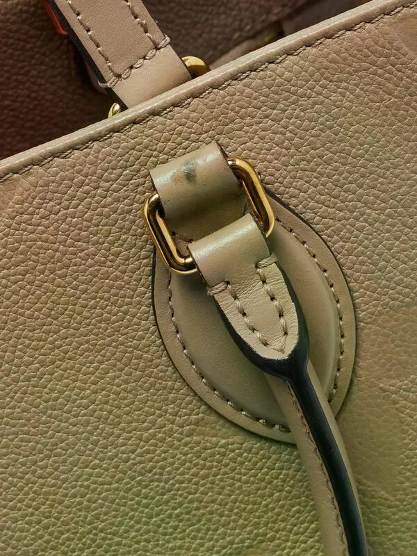 LOUIS VUITTON Mm Onthego Monogram Empreinte Tote Bag