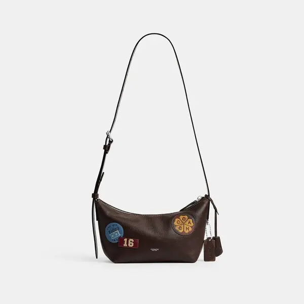 COACH Mott Sling Bag 22 In Loved Leather With Stickers - Maple