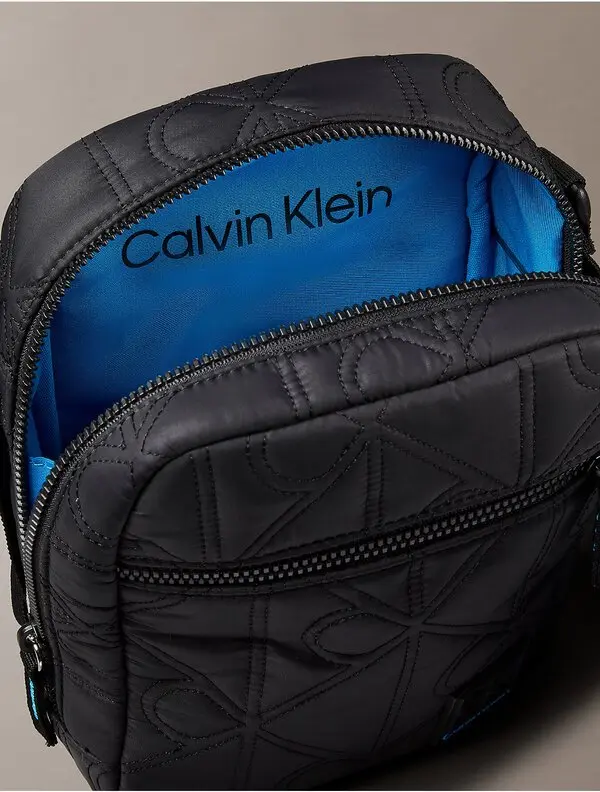 Calvin Klein Emblem Logo Puffer Reporter Bag