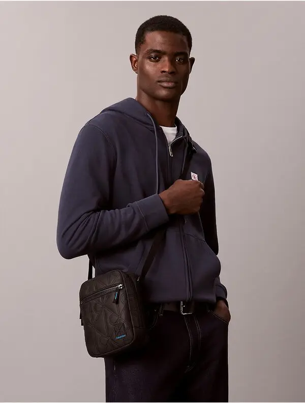Calvin Klein Emblem Logo Puffer Reporter Bag