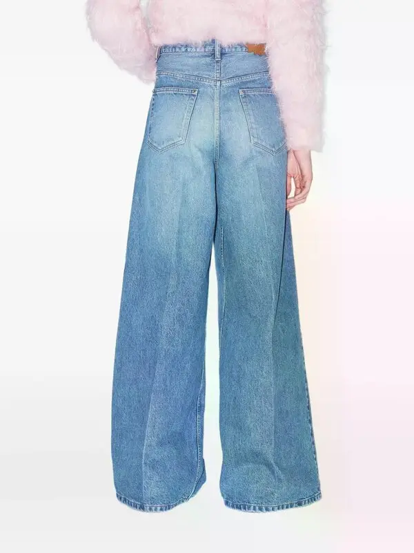 TOGA TOO Pleated Zip-detail Jeans