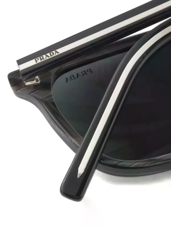 Prada Sunglasses With The Iconic Metal Plaque