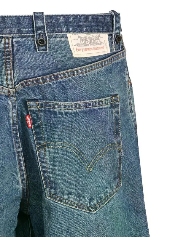 Sacai Belted Faded-effect Jeans
