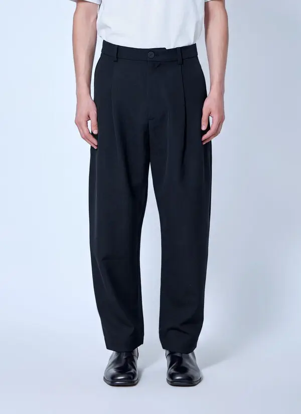 Studio Nicholson Tuck Cotton Tapered Leg Trousers - Black