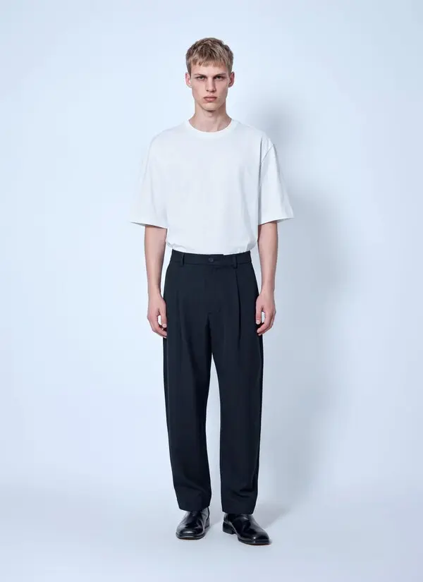 Studio Nicholson Tuck Cotton Tapered Leg Trousers