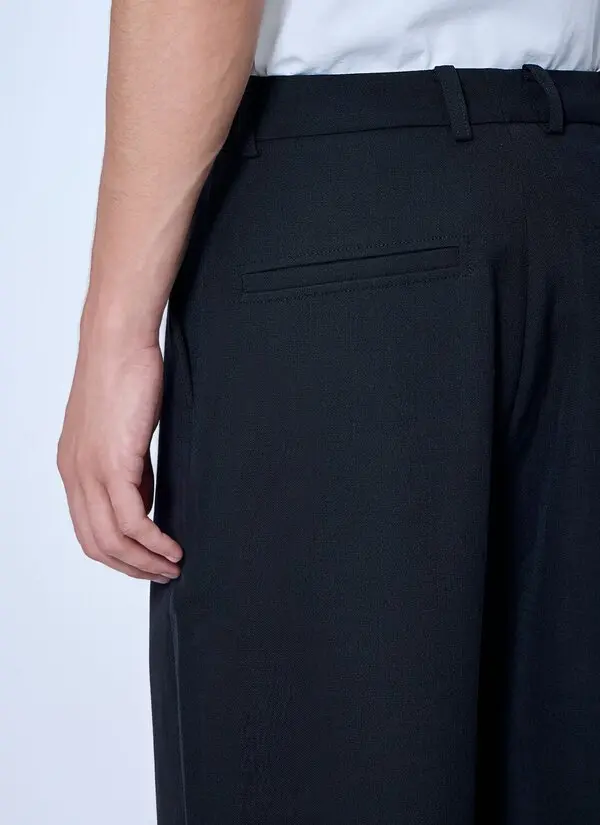 Studio Nicholson Tuck Cotton Tapered Leg Trousers