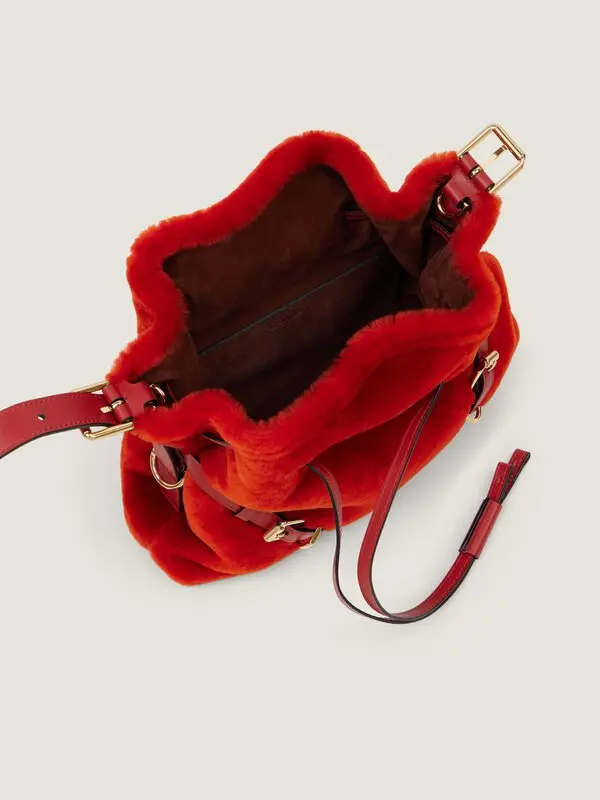 Givenchy Small Voyou Bucket Bag In Shearling