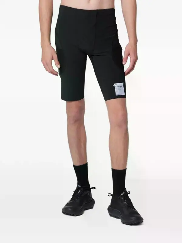 Satisfy Logo-patch Panelled Shorts - Black