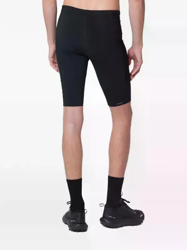 Satisfy Logo-patch Panelled Shorts