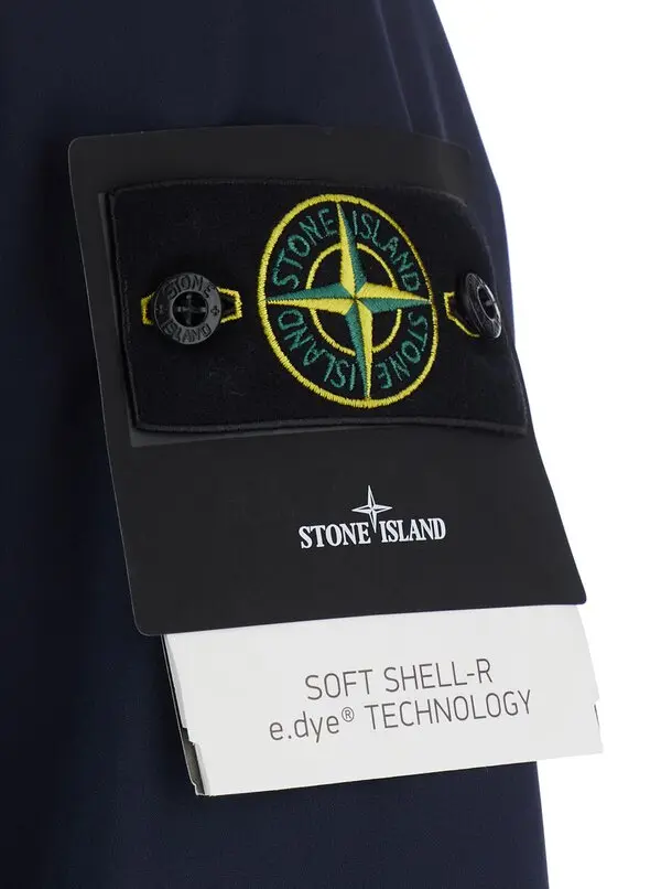 Stone Island Blue Jacket With Hood And Logo Patch On The Sleeve In Tech Fabric
