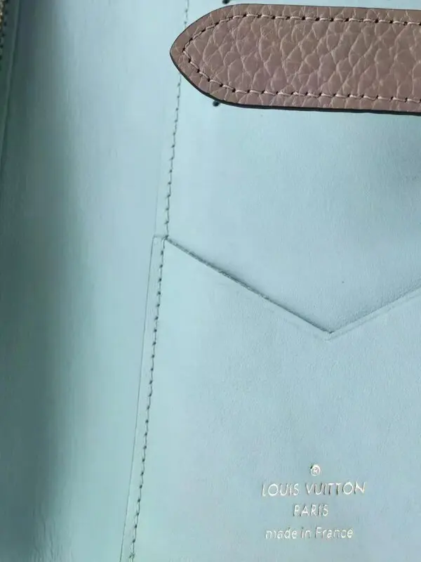LOUIS VUITTON Capucines Vertical Wallet Leather Small Wallets