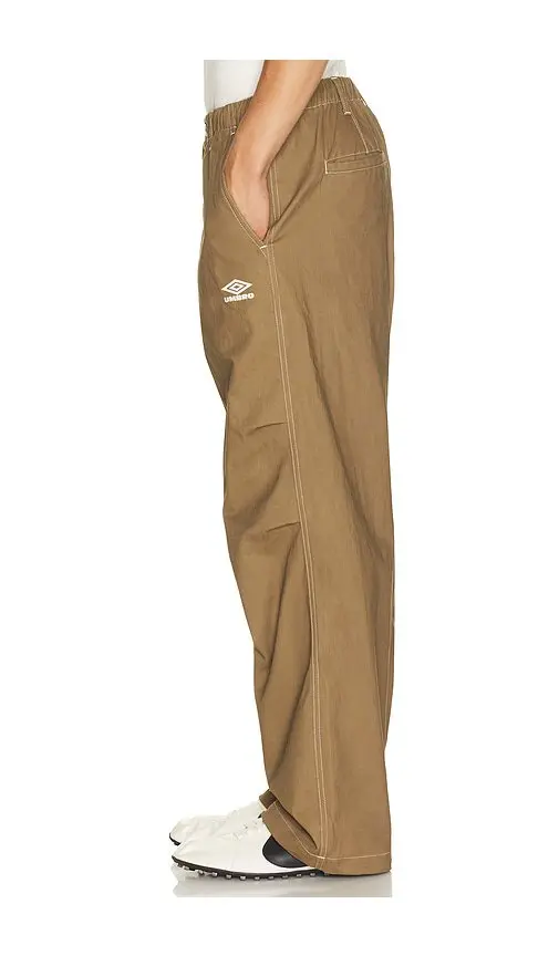 PLEASURES X Umbro Manchester Relaxed Pants In Brown