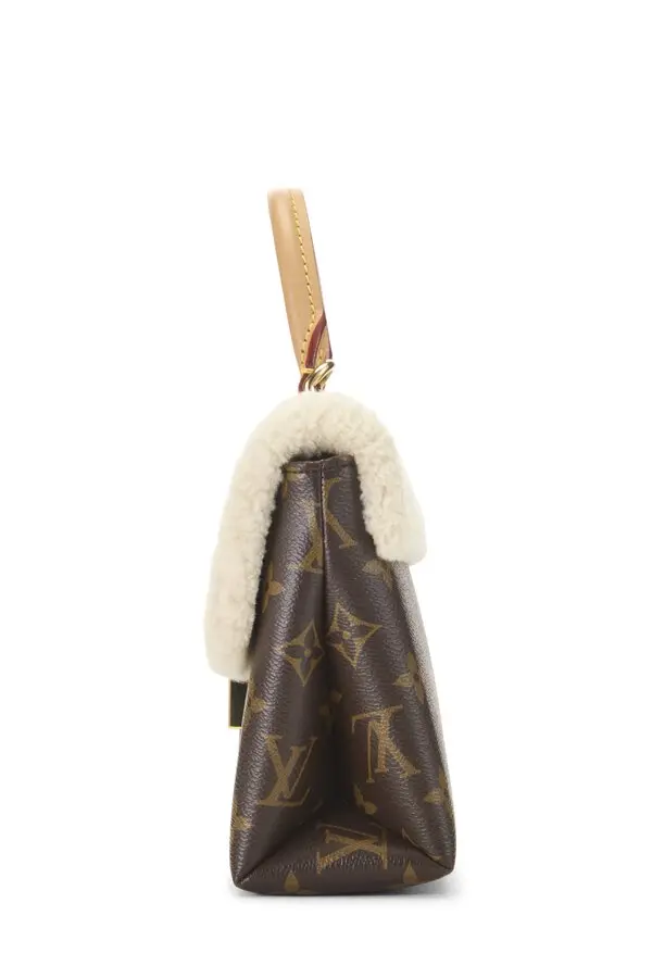 LOUIS VUITTON Shearling Monogram Canvas Locky
