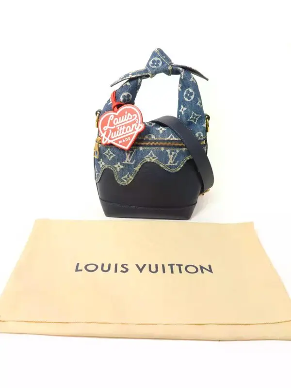 LOUIS VUITTON Monogram Japanese Cruiser Handbag