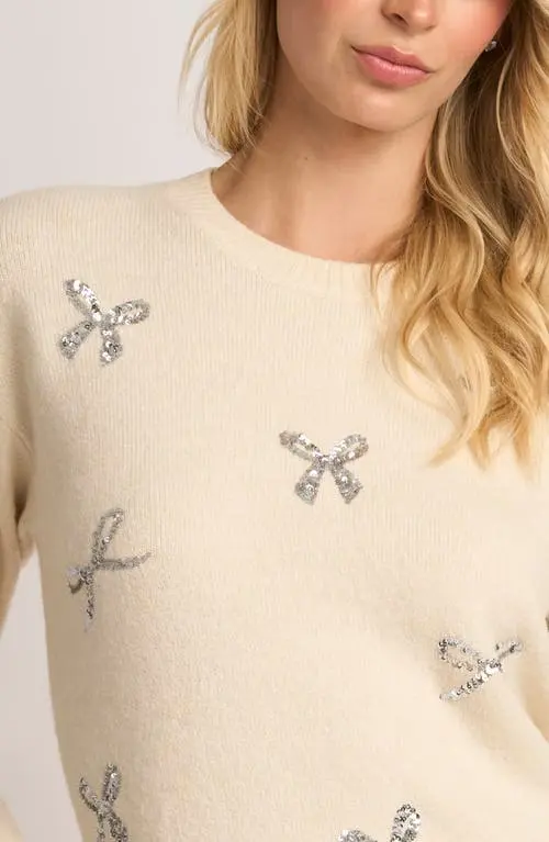 CECE DUPRAZ Sequin Bow Crewneck Sweater