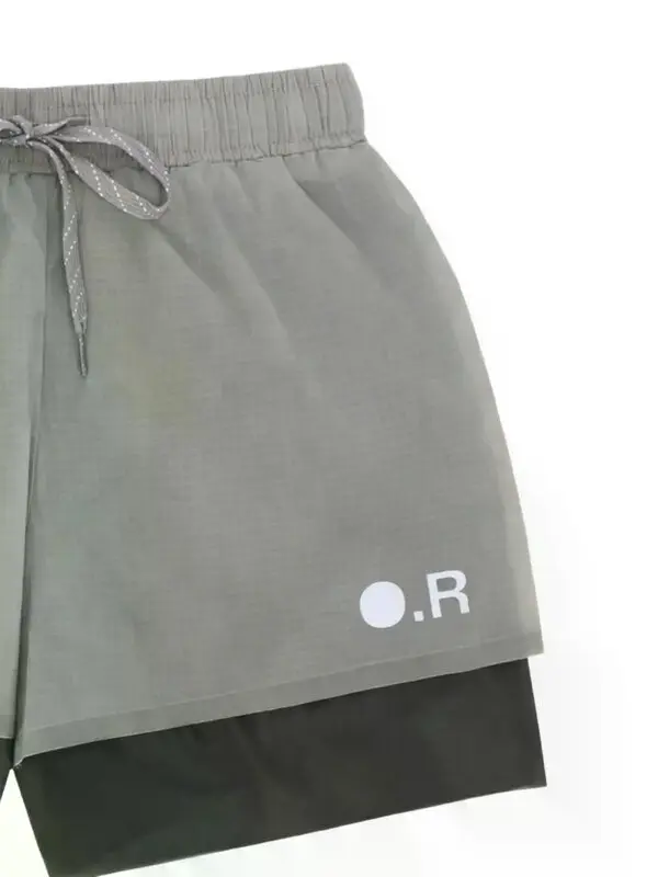 OPTIMISTIC RUNNERS Logo-print Layered Shorts