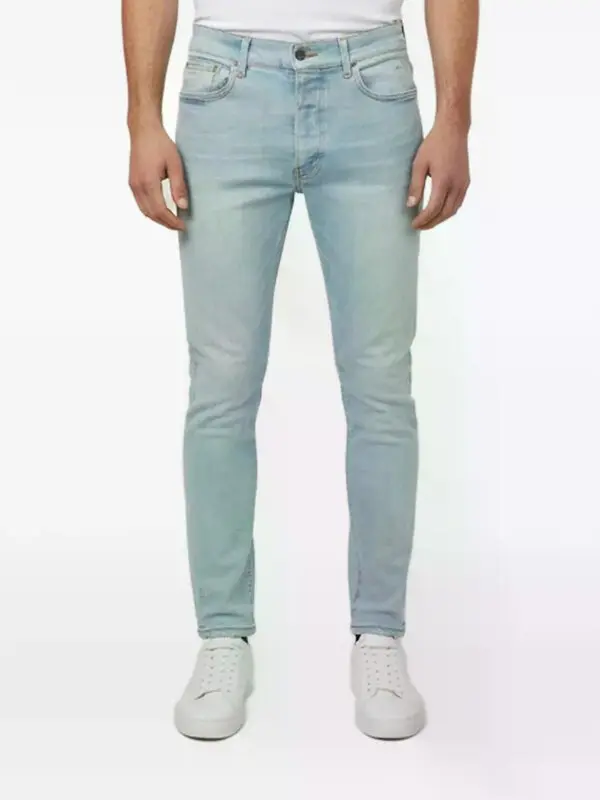 Amiri Faded-effect Skinny Fit Jeans