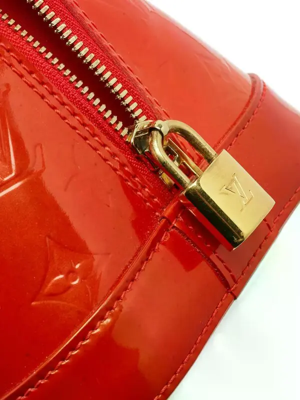 LOUIS VUITTON 2012 Pm Alma Monogram Vernis Handbag