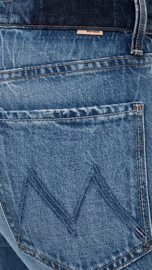 MOTHER Bookie Slit Twist Heel Fray Jeans
