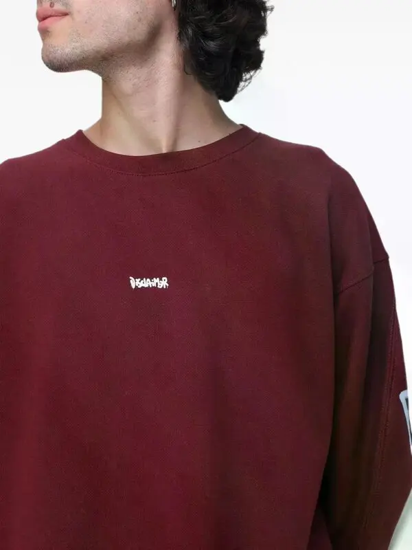 DISCLAIMER Graffiti-print Sweatshirt
