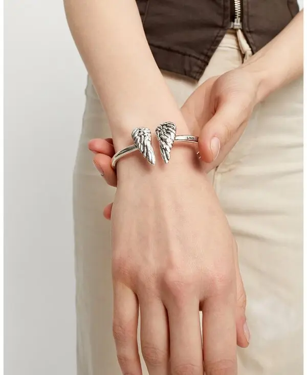 UNODE50 Sterling -plated Rigid Bracelet With Wing Detail At The Ends