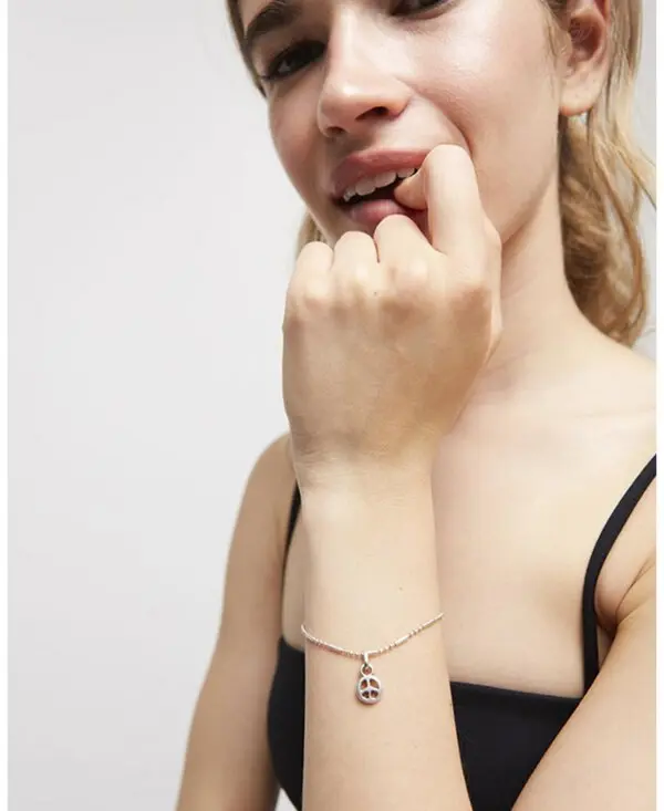 UNODE50 Charm With A Peace Symbol