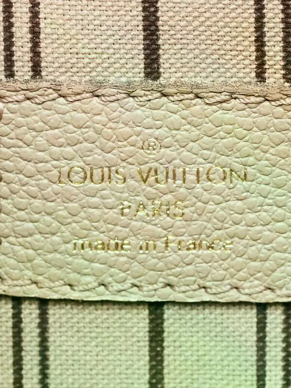 LOUIS VUITTON Pochette Métis Monogram Empreinte Handbag