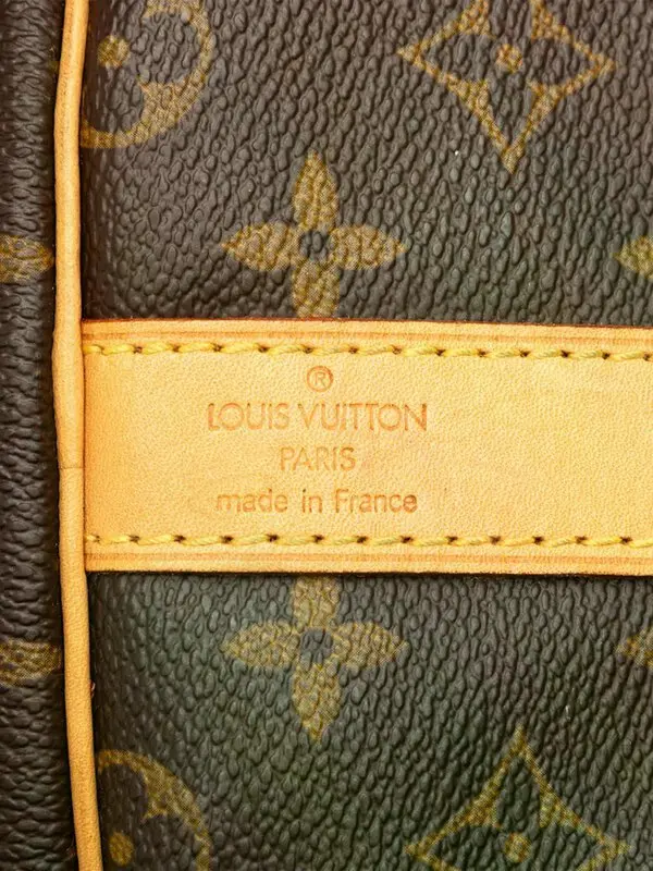 LOUIS VUITTON 1997 Monogram Keepall Bandouliere 60 Travel Bag