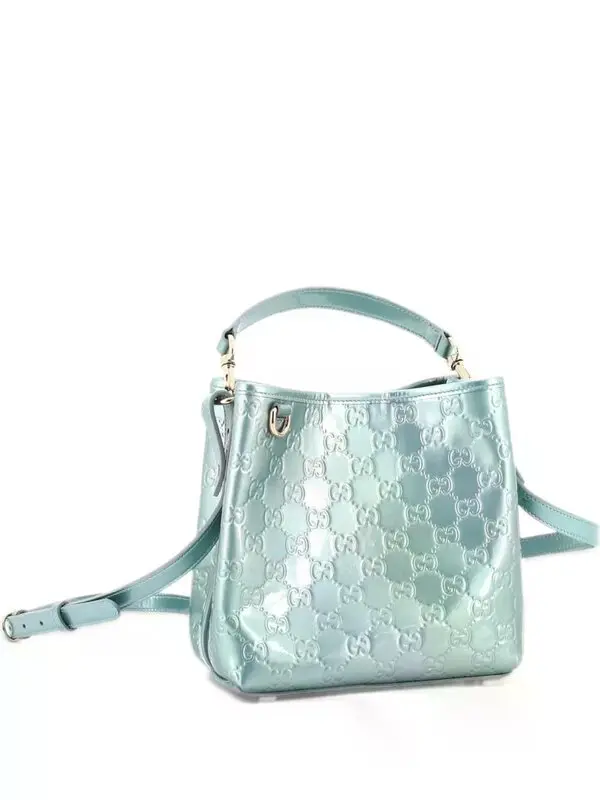 Gucci Emblem Gg Embossed Patent Small Bucket Bag