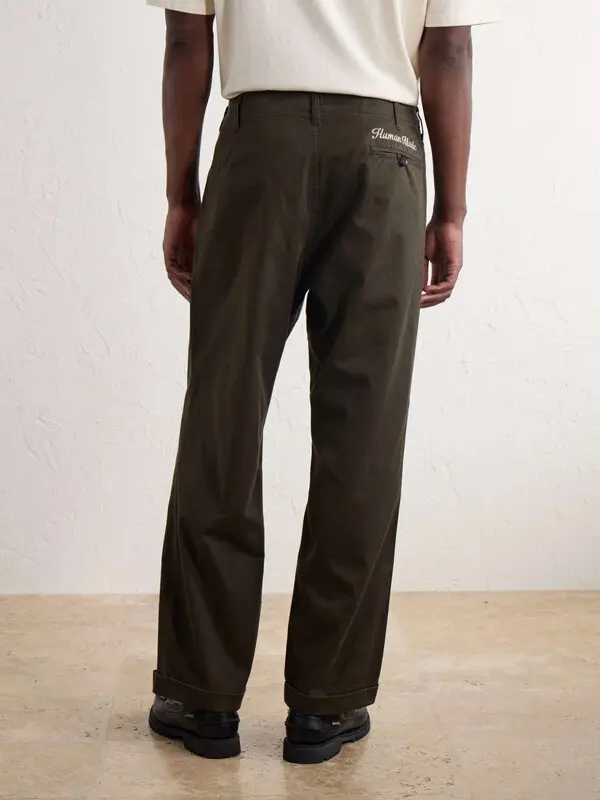 HUMAN MADE Tapered Logo-embroidered Pleated Cotton-twill Trousers