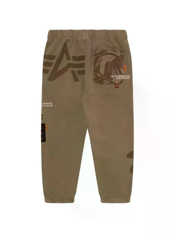 AAPE BY *A BATHING APE X Alpha Industries Moonface Logo-print Track Pants