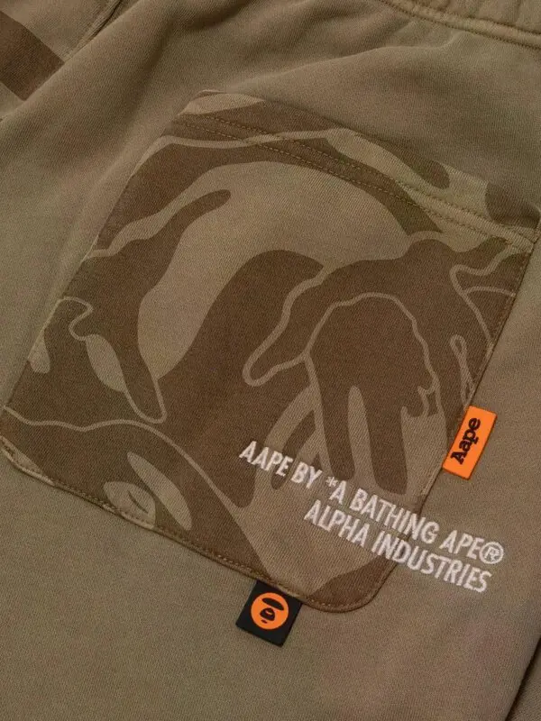 AAPE BY *A BATHING APE X Alpha Industries Moonface Logo-print Track Pants