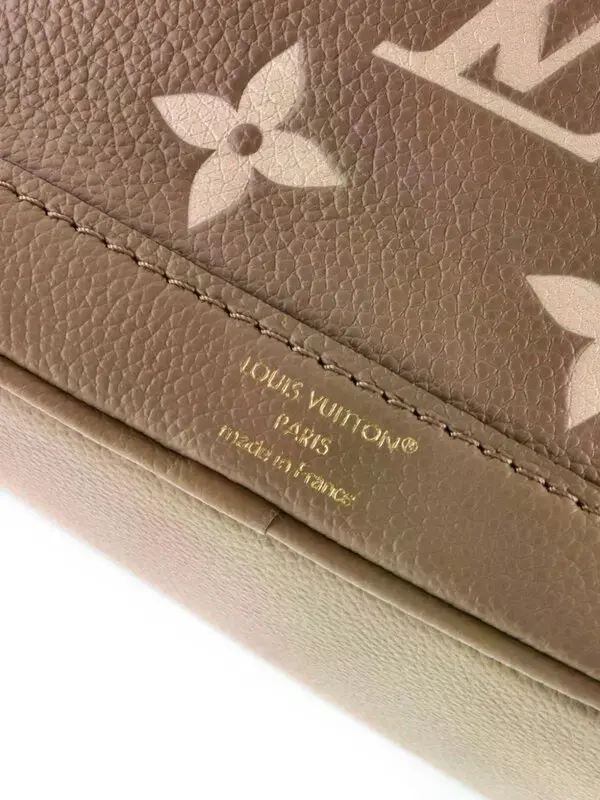 LOUIS VUITTON Noe Nm Handbag Bicolor Monogram Empreinte Leather Nano Bucket Bag - Neutrals