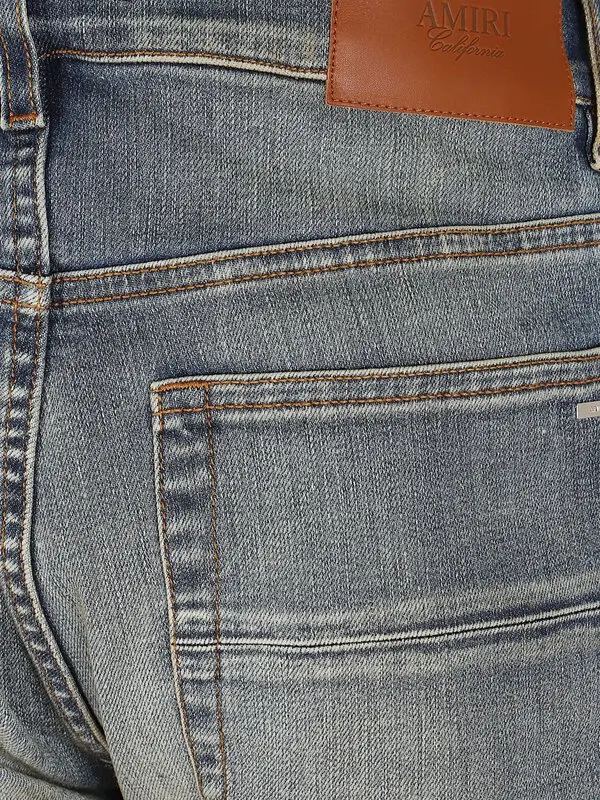Amiri Mid-rise Straight Fit Distressed Stretch-denim Jeans