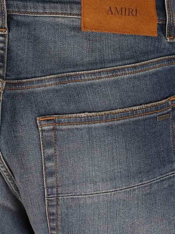 Amiri Slim Fit Distressed Denim Jeans With Worn Effect And Five-pocket Design